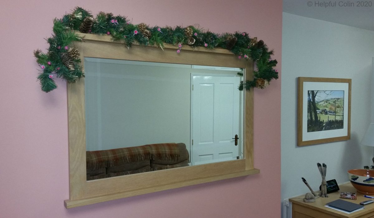 Draping A Christmas Garland Over A Mirror or Picture - Helpful Colin